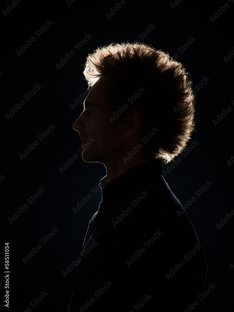 profile of man in black shadow Stock Photo | Adobe Stock