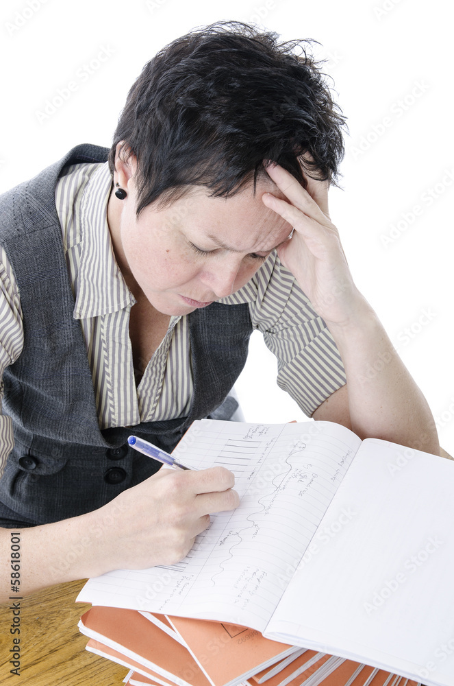 confused teacher marking students work Stock Photo | Adobe Stock