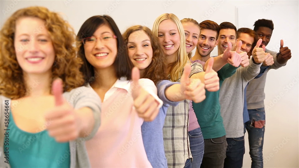 Team of students holding thumbs up Stock Video | Adobe Stock