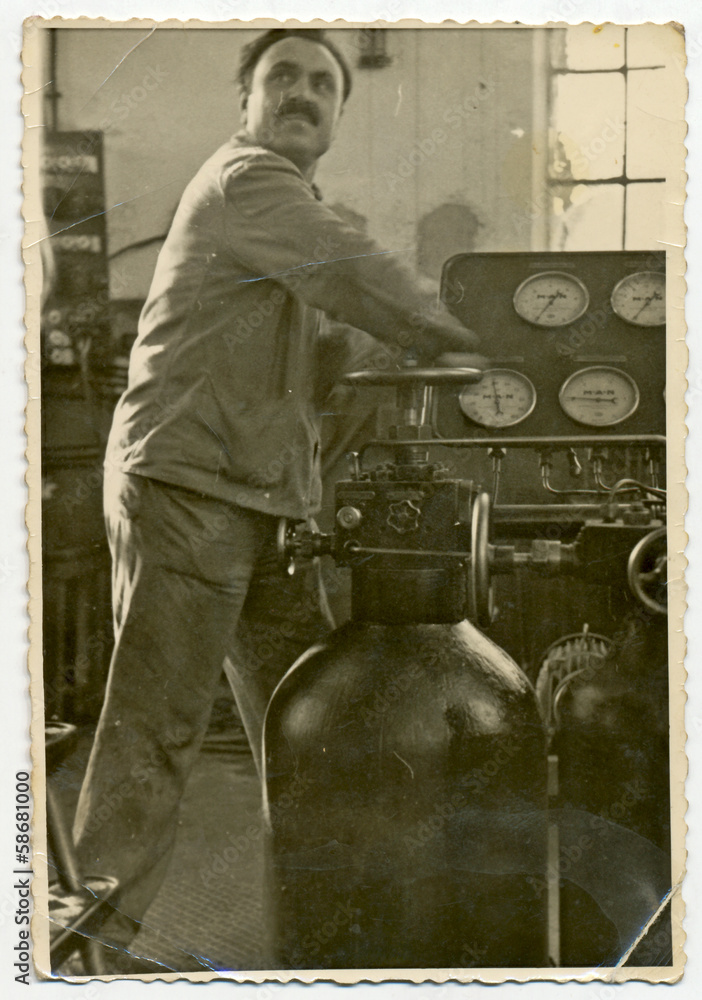 CIRCA 1955: In the factory, middle-aged man operated machines Stock ...