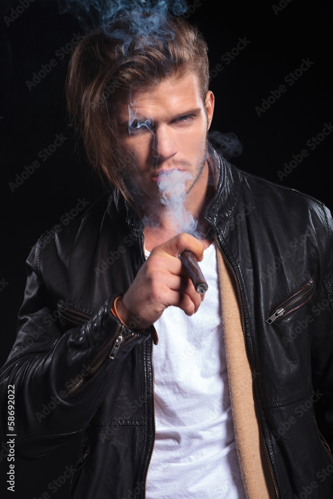 man in leather jacket smoking a big cigar Stock Photo | Adobe Stock