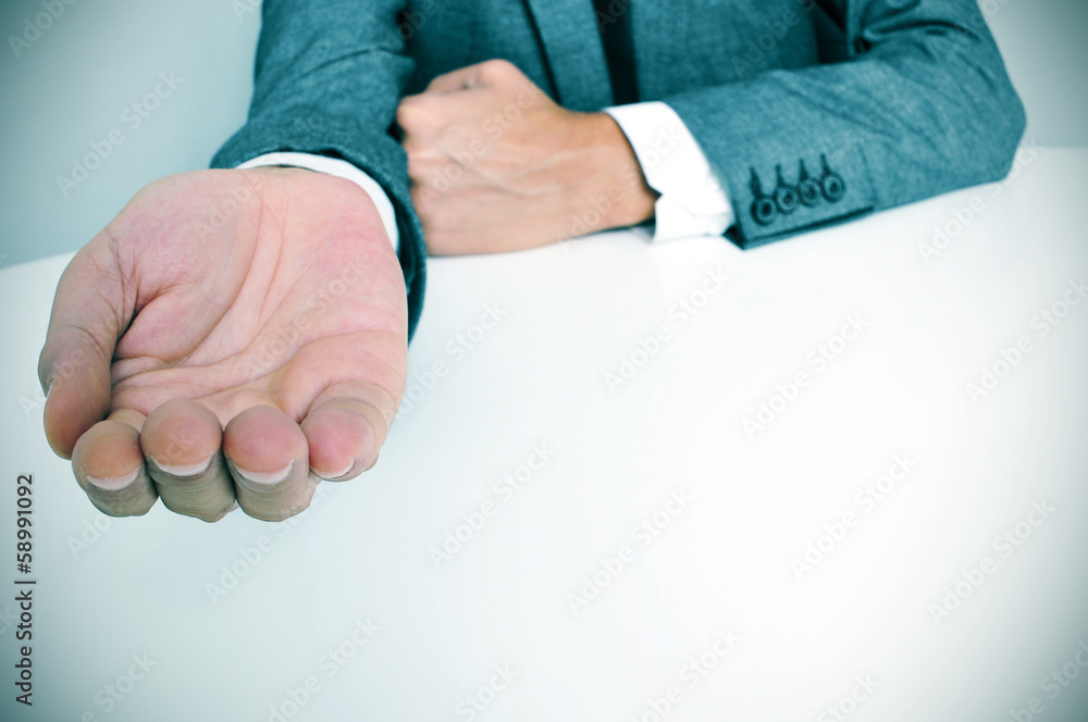 man in suit with an outstretched hand Stock Photo | Adobe Stock