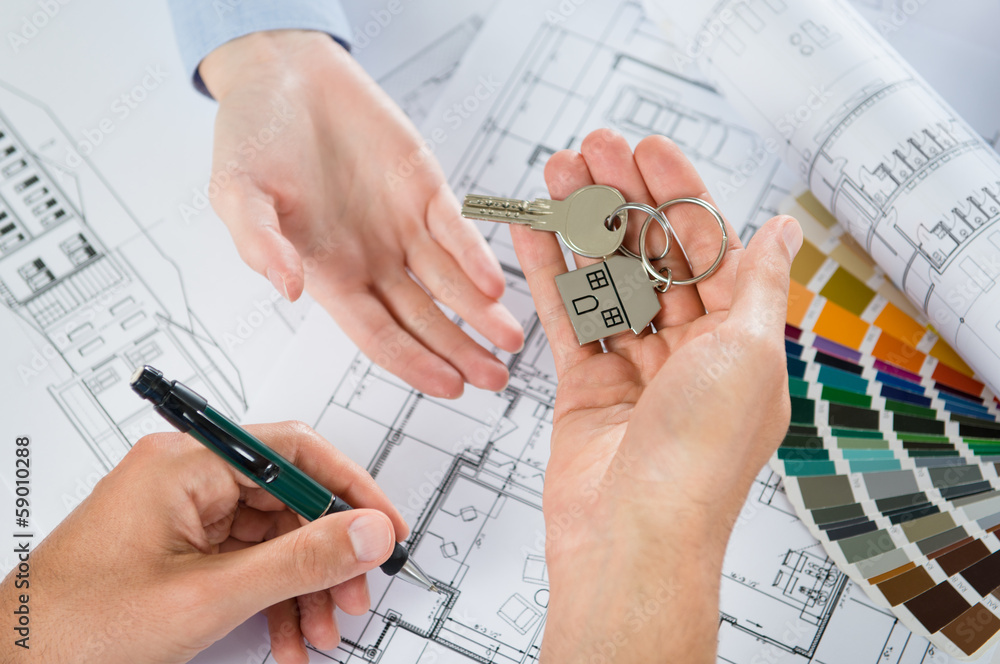 Architect Handing Keys Stock Photo | Adobe Stock