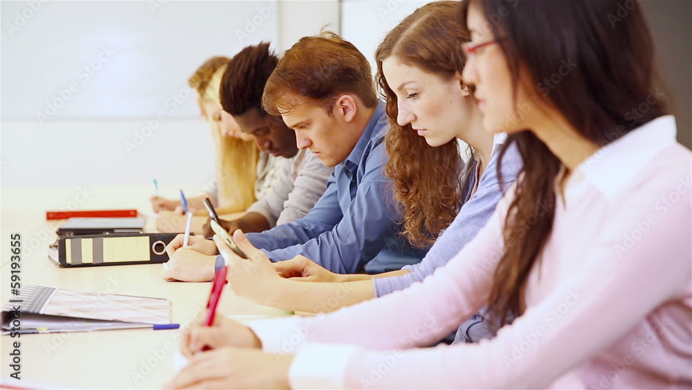 Group of students studying in university Stock Video | Adobe Stock