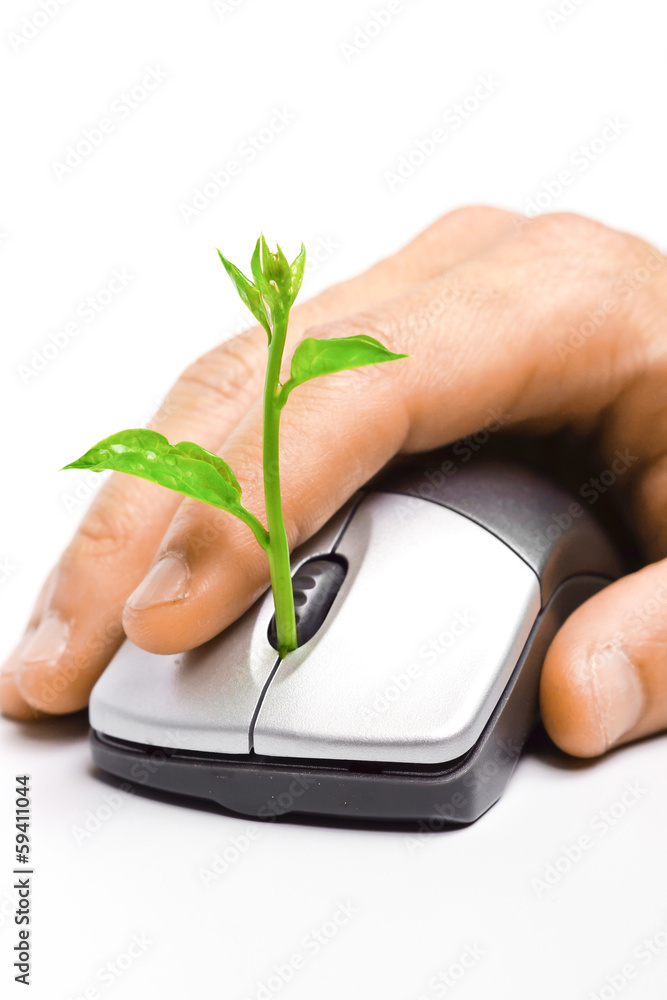 a tree growing on a mouse Stock Photo | Adobe Stock