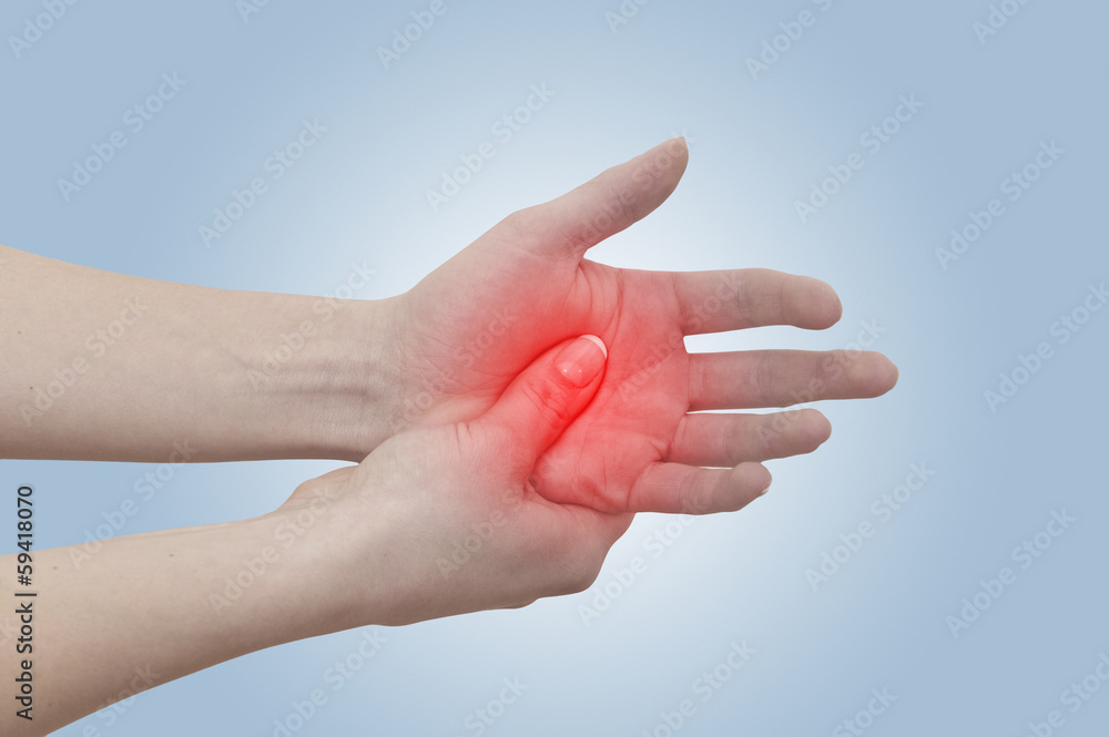 Acute pain in a man palm. Female holding hand to spot of palm-ac Stock ...