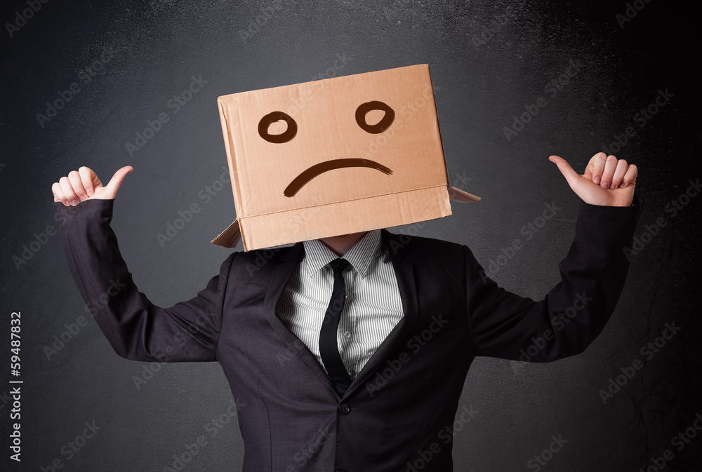 Businessman gesturing with cardboard box on his head with sad fa Stock ...