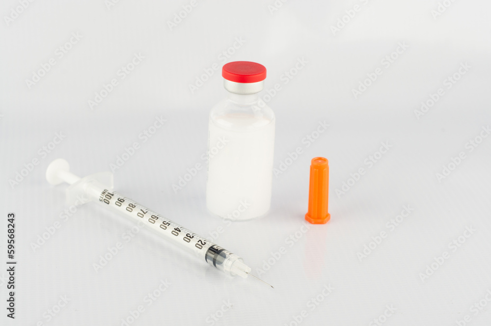 Disposable syringe and insulin vial Stock Photo | Adobe Stock