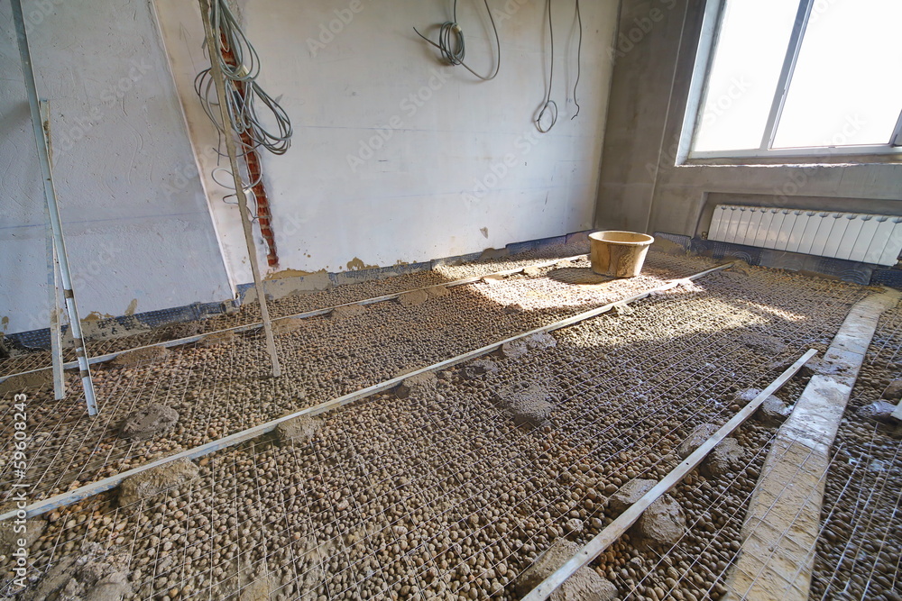 Expanded clay aggregate with bucket on floor Stock Photo | Adobe Stock