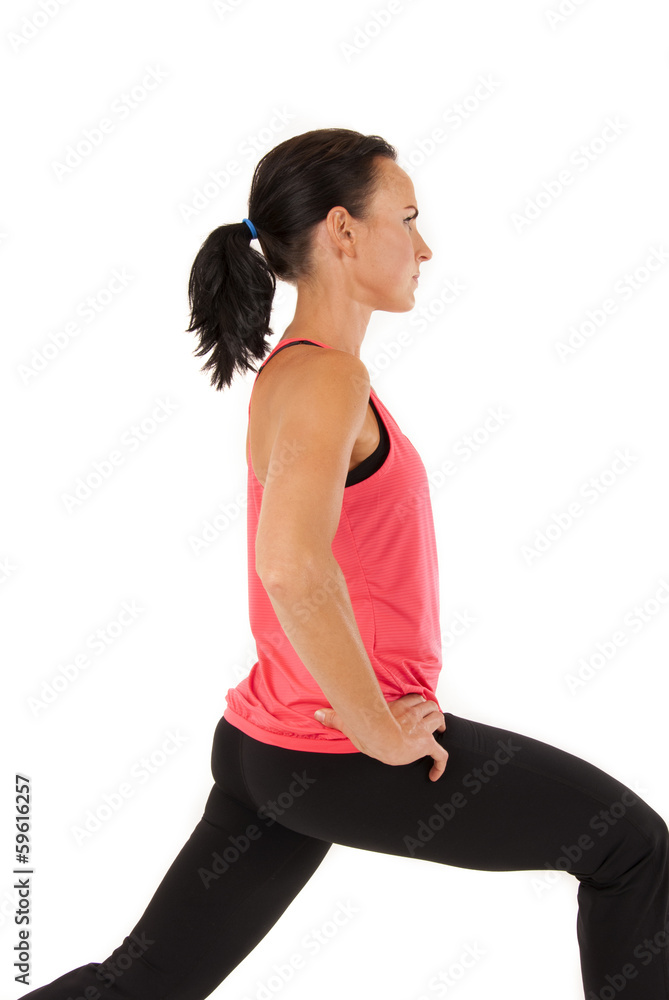 attractive female model squatting down during workout Stock Photo ...