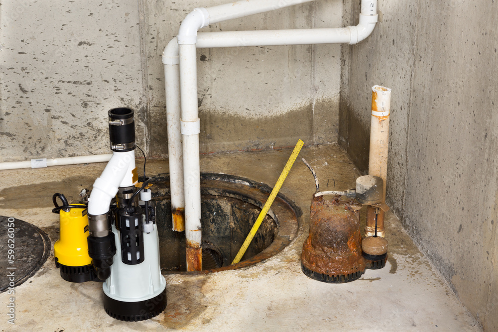 Replacing the old sump pump in a basement Stock Photo | Adobe Stock