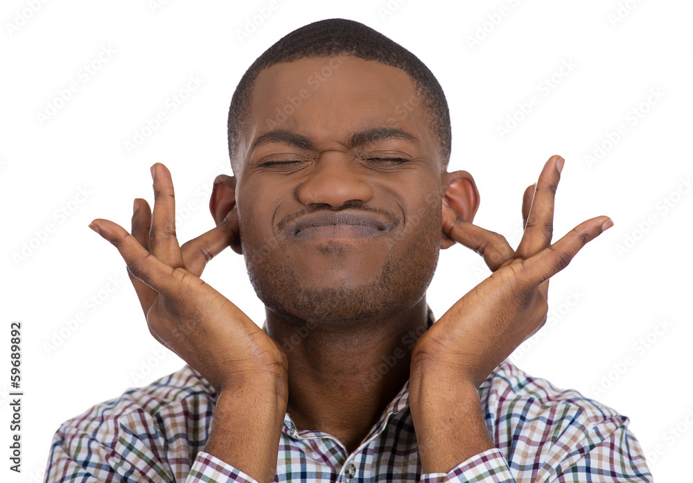 Stressed man, closing his eyes, ears can't take it anymore Stock 写真 ...