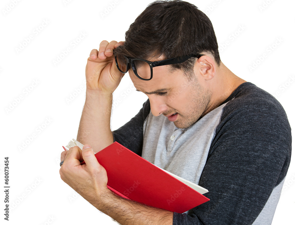 Man having difficulties reading because of vision problems foto de ...