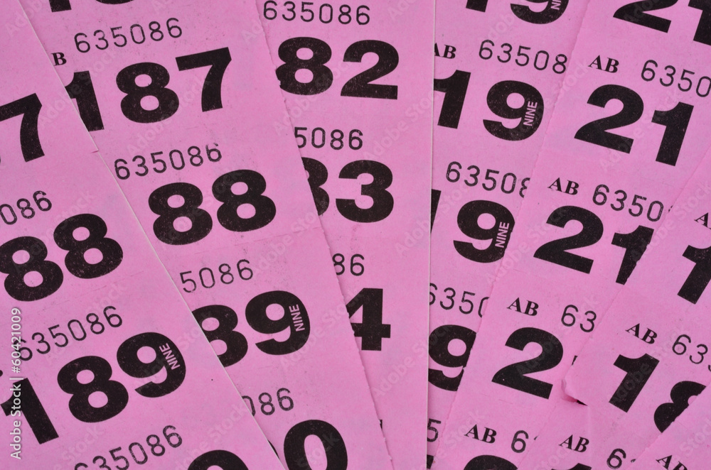 Purple raffle tickets spread out Stock Photo | Adobe Stock
