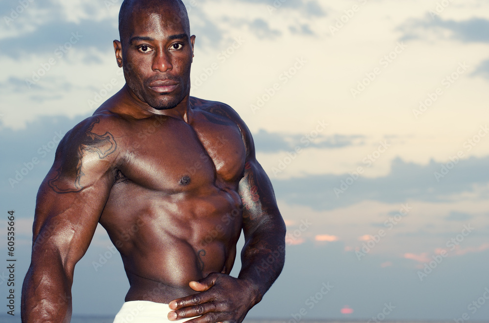 Strong man with perfect abs, shoulders,biceps, triceps and chest Stock ...