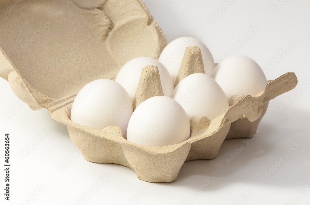 Weiße Eier im Karton Stock Photo | Adobe Stock