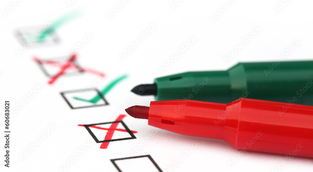 Check list with green and red pen Stock Photo | Adobe Stock