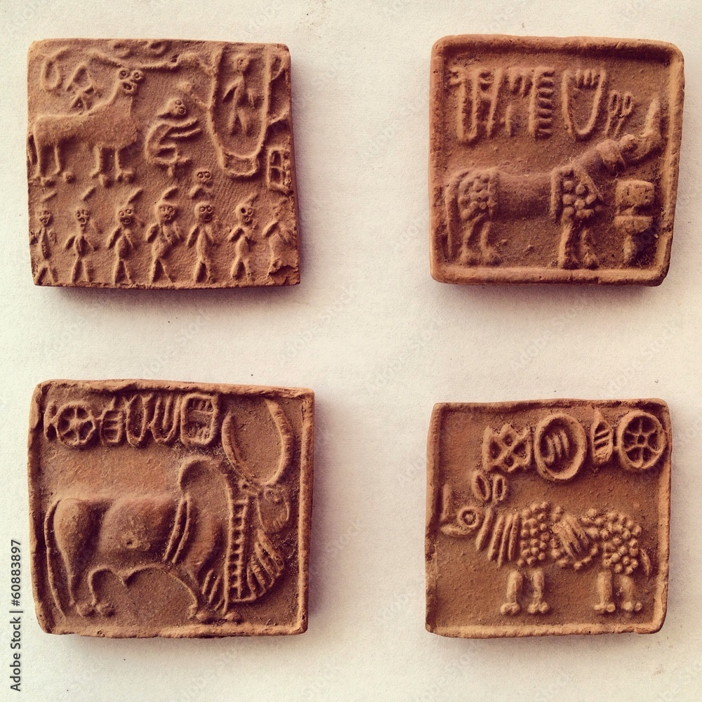 Ancient civilization drawings on clay bricks Stock Photo | Adobe Stock