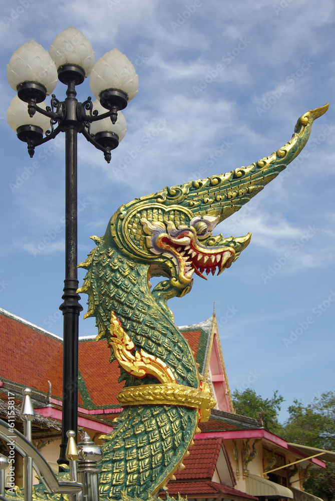Dragon sculpture on the territory of the Temple Wat Phokha Jutha Stock ...