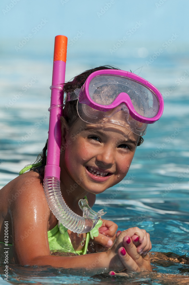 little girl with a mask for diving Stock Photo | Adobe Stock