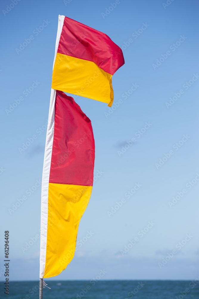 Red and yellow flags of surf life saving Australia Stock Photo | Adobe ...
