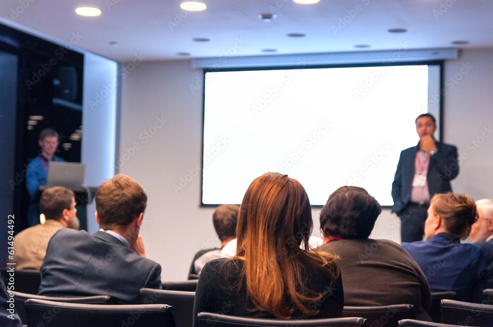 people sitting back at the business conference Stock Photo | Adobe Stock