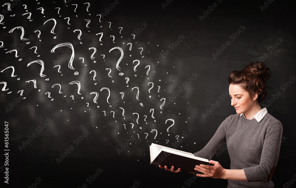 Pretty woman reading a book with question marks coming out from Stock ...