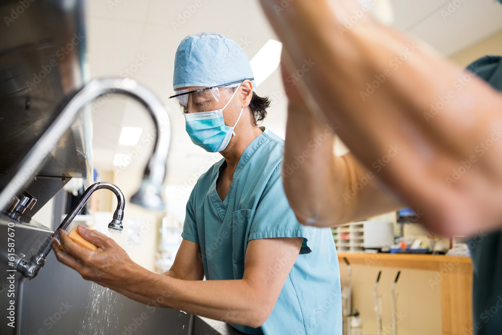 Surgical Scrubbing Hands and Arms Stock Photo | Adobe Stock