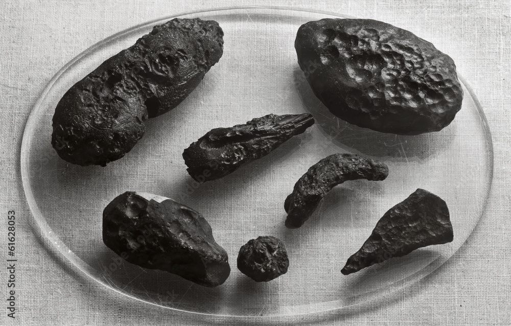 black tektite meteorites, specimen Stock Photo | Adobe Stock