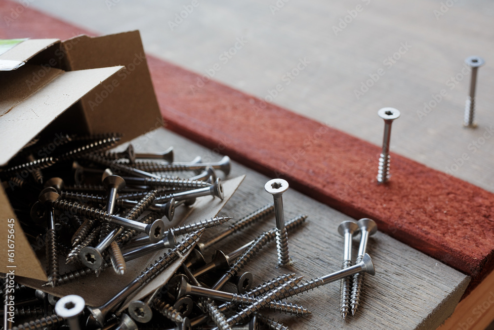 Planks and screws for a wood boarding of an exterior wall Stock Photo ...