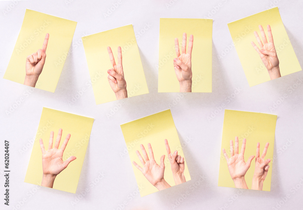 numbering days of the week with fingers on pieces of paper Stock Photo ...