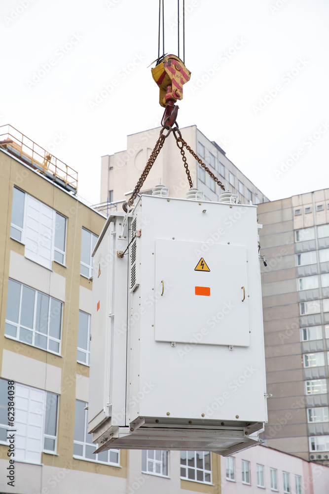 Hoisting works for electrical substation lifting with crane Stock Photo ...