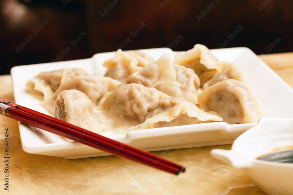 Jiaozi - Chinese dumplings filled with pork and spring onions. Stock ...