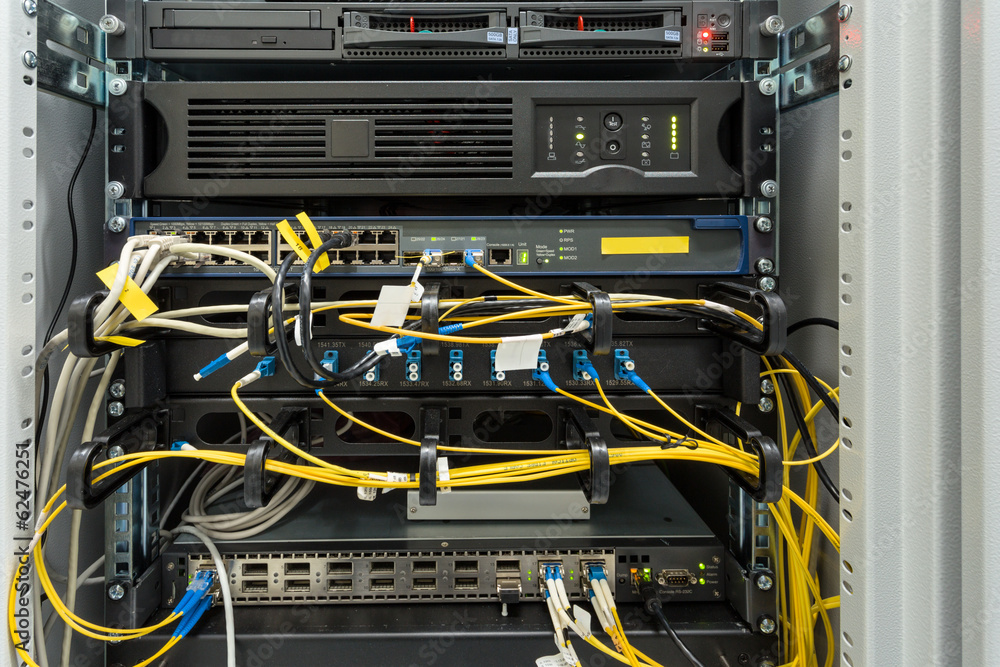 fiber optic datacenter with media converters and optical cables Stock ...