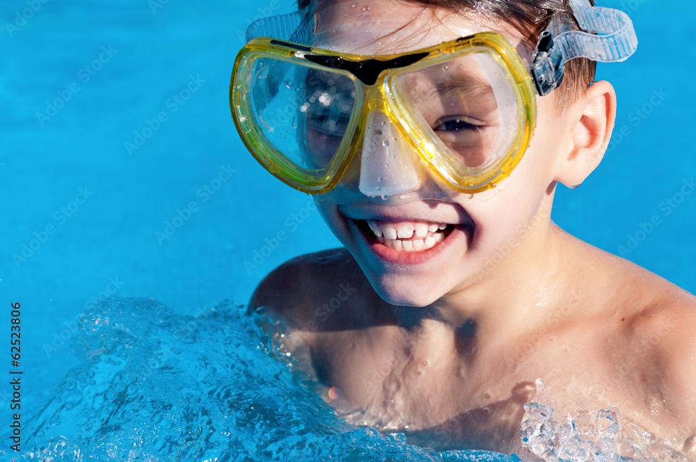 Boy in pool Stock Photo | Adobe Stock
