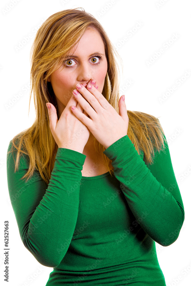 Frau hält sich den Mund zu Stock-Foto | Adobe Stock