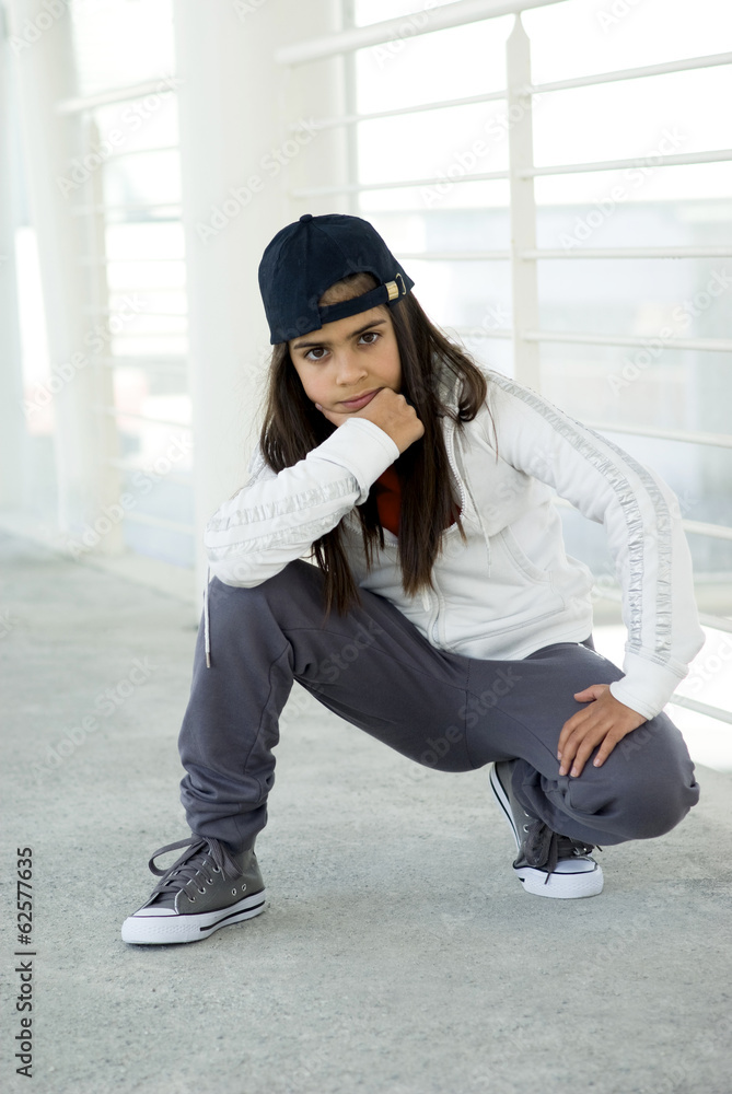 Preteen mixed race girl posing Stock Photo | Adobe Stock
