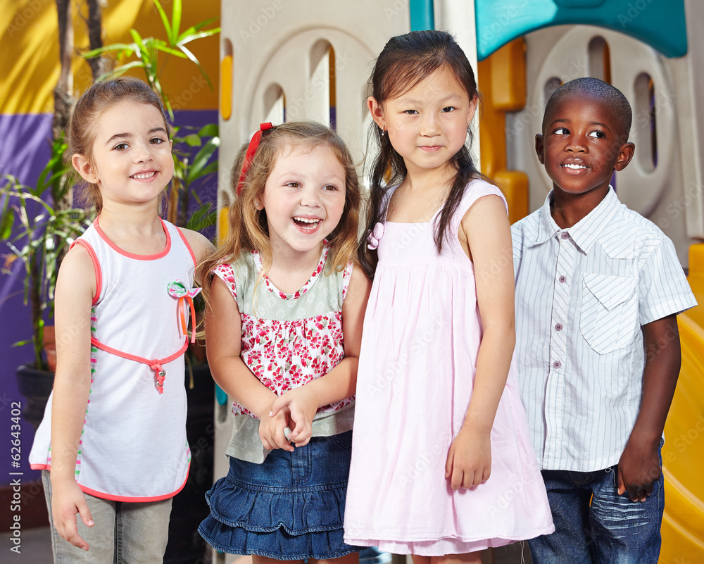 Lachende Kinder zusammen im Kindergarten Stock Photo | Adobe Stock