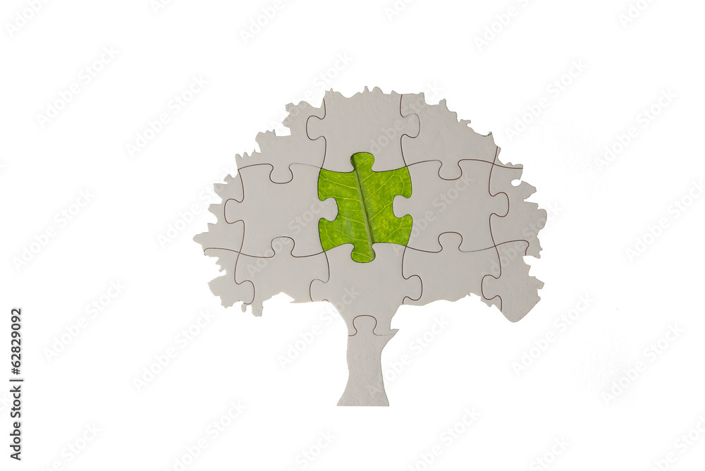 jigsaw puzzle tree with green leaf Stock Photo | Adobe Stock