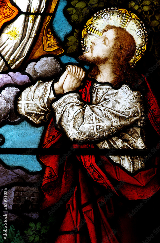 Jesus praying in stained glass Stock Photo | Adobe Stock