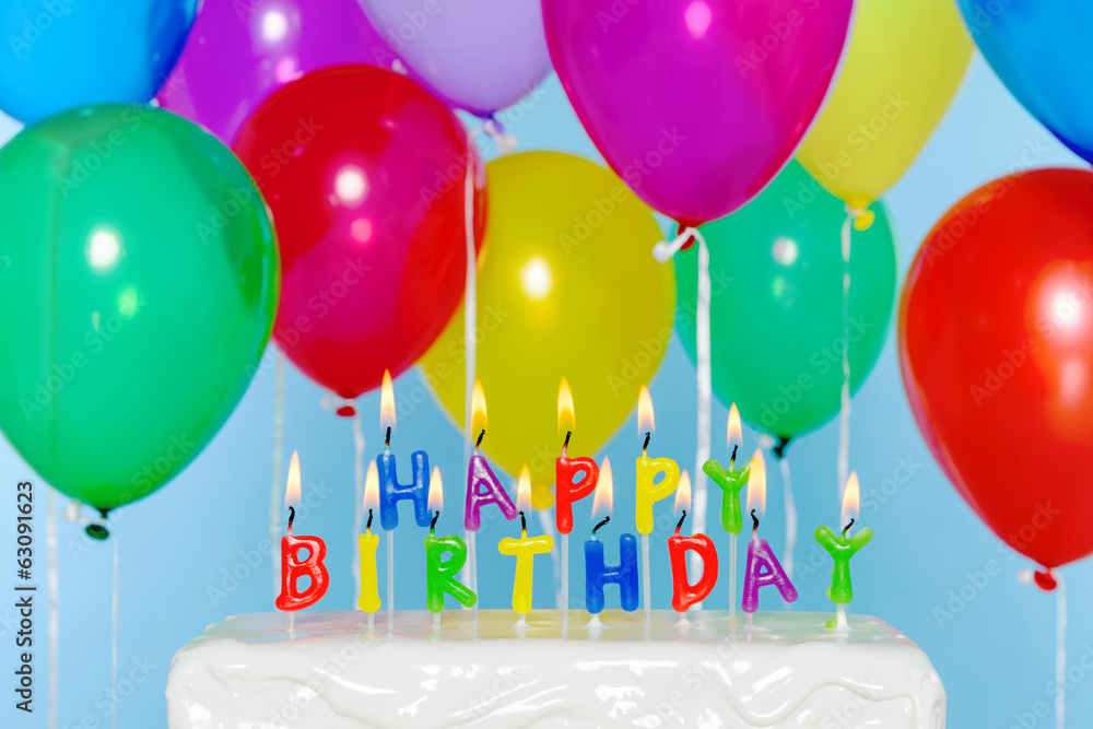 Happy Birthday candles on cake with balloons Stock Photo | Adobe Stock