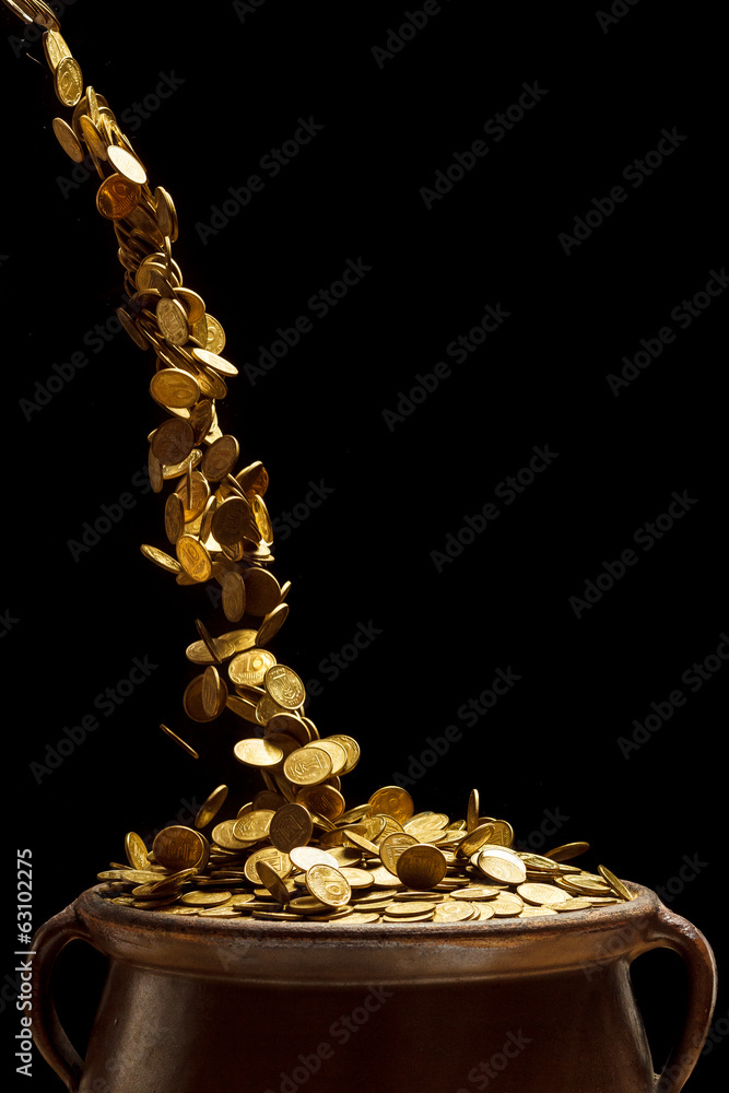 gold coins falling in the vintage pot Stock Photo | Adobe Stock