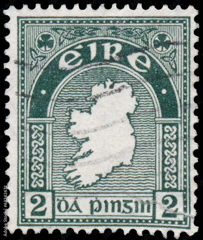 Stamp printed in Ireland shows a map of the country Photos | Adobe Stock