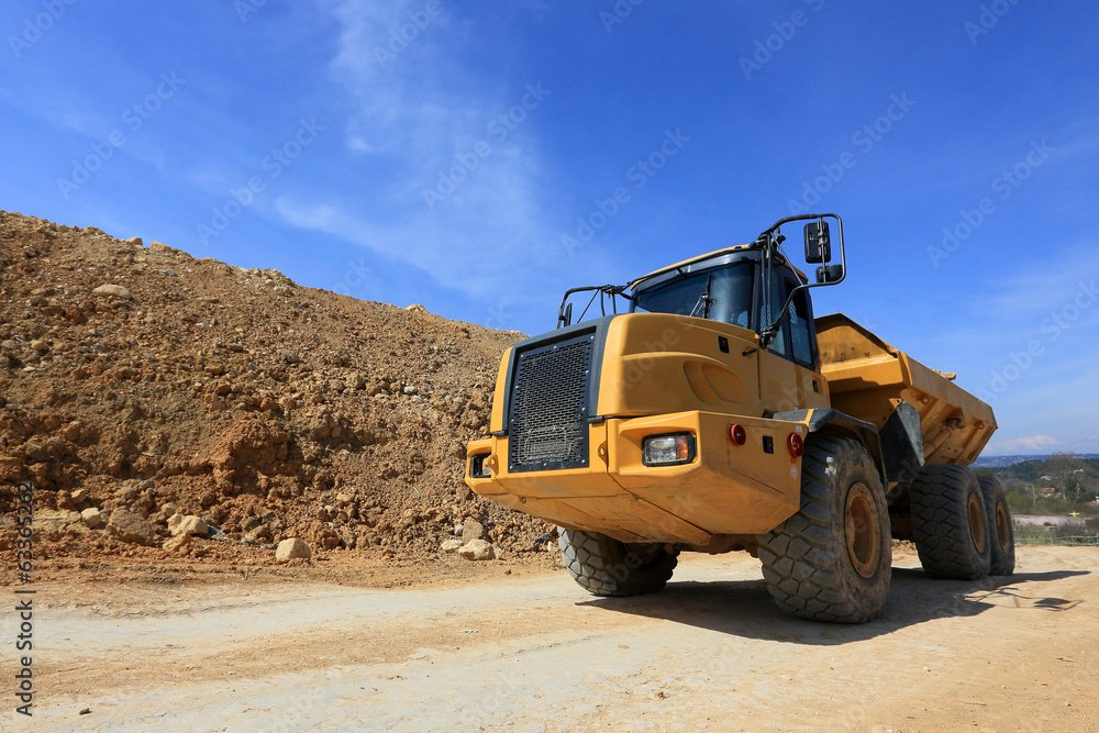 engins de chantier en action Photos | Adobe Stock