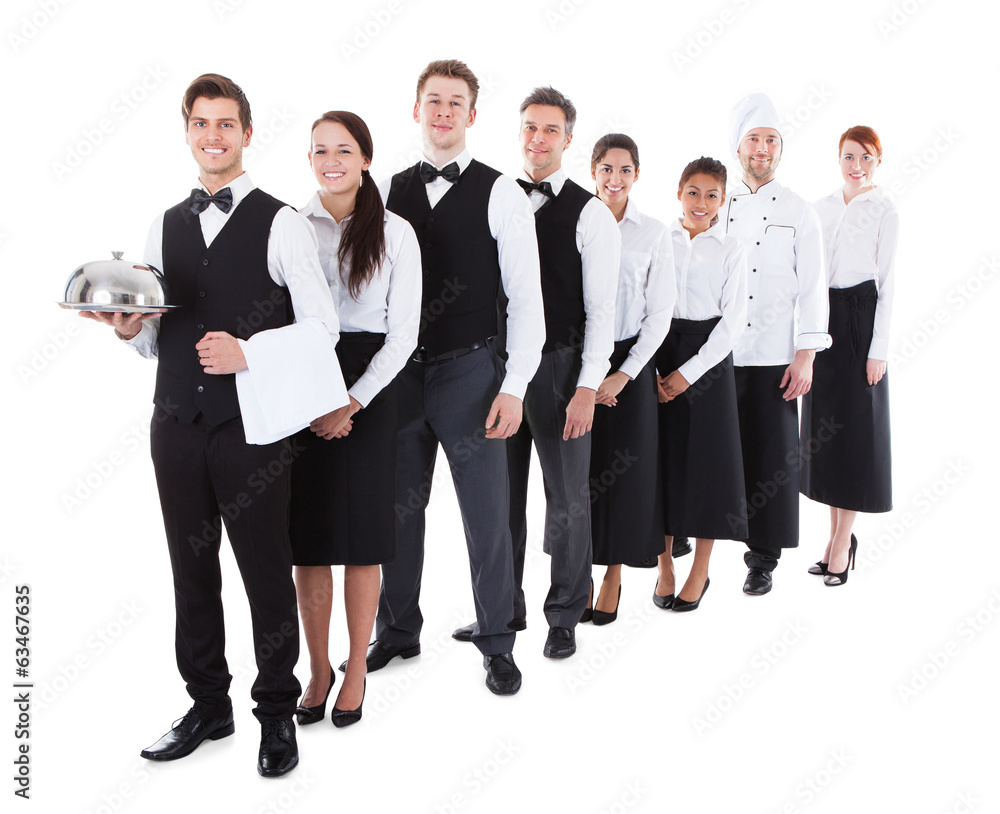 Large group of waiters and waitresses standing in row Stock-Foto ...