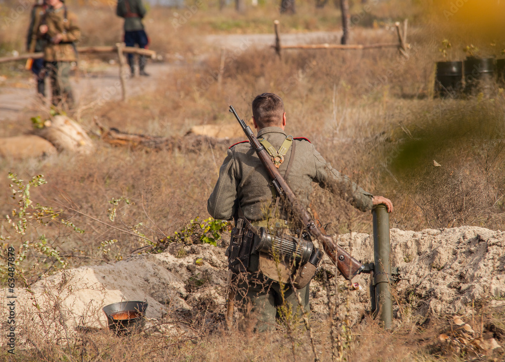 WWII German Soldier ready for shooting with mortar in trench . Stock ...