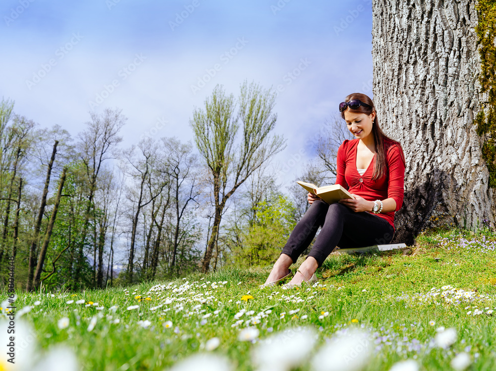 Woman Reading Outside