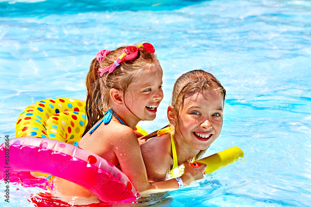 Children in swimming pool. Stock Photo | Adobe Stock