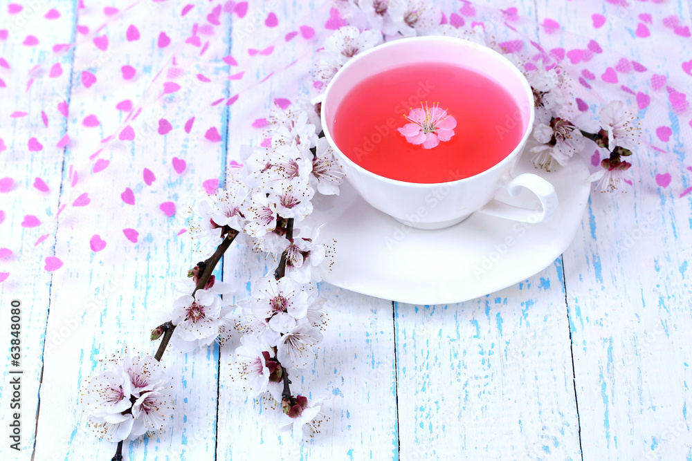 Fragrant tea with flowering branches on wooden table close-up Stock ...
