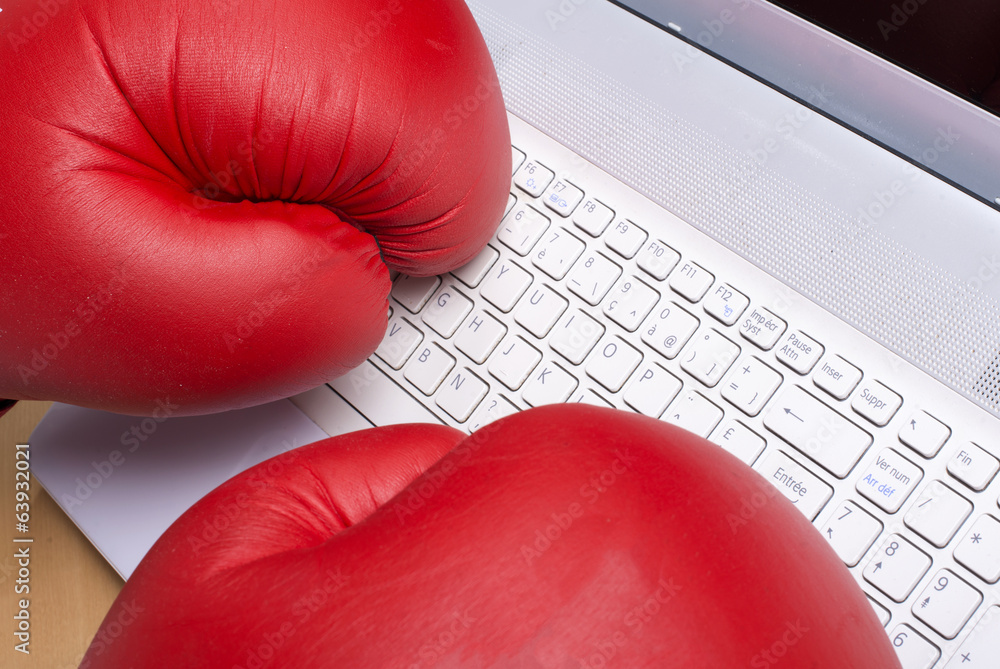 writing with boxing gloves on a keyboard Stock Photo | Adobe Stock
